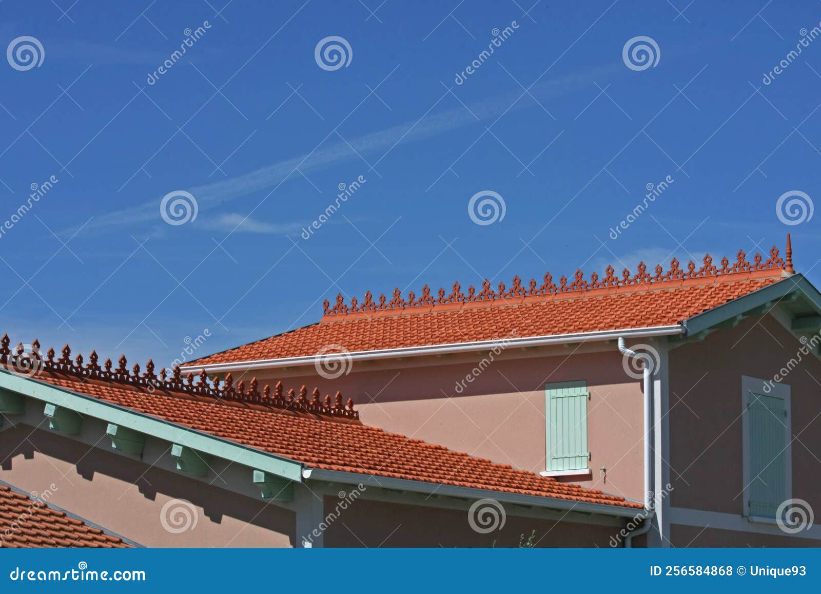 Tile Roof of a House with a Decorative Ridge Stock Photo - Image of ...
