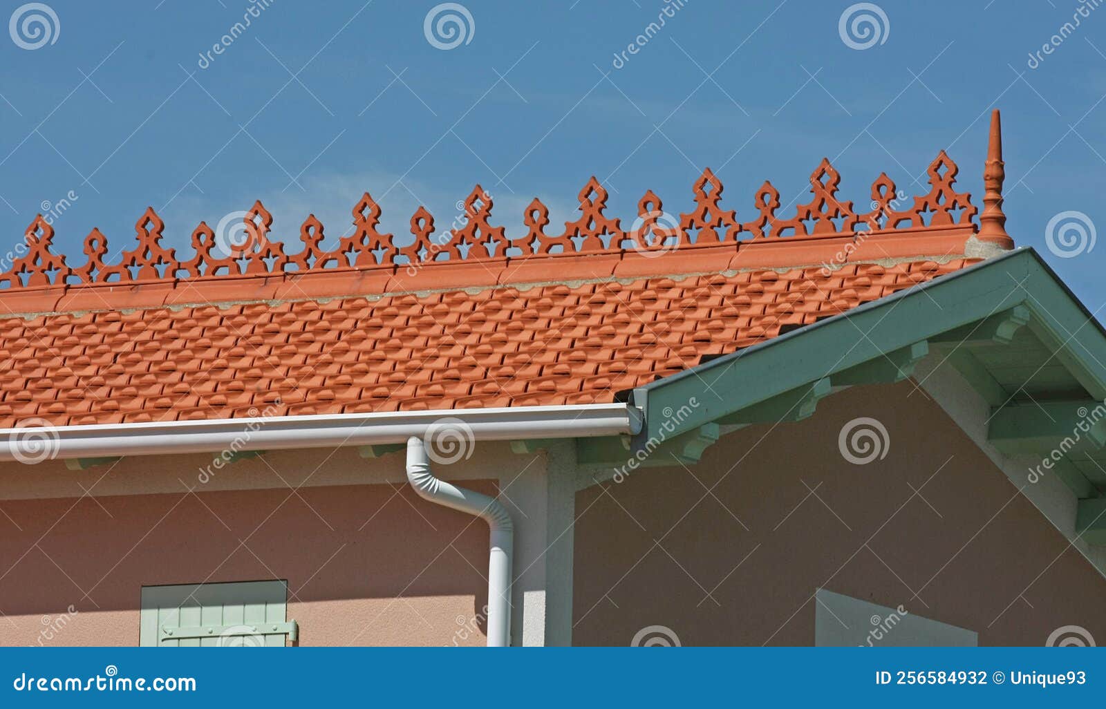 Tile Roof of a House with a Decorative Ridge Stock Photo - Image of ...