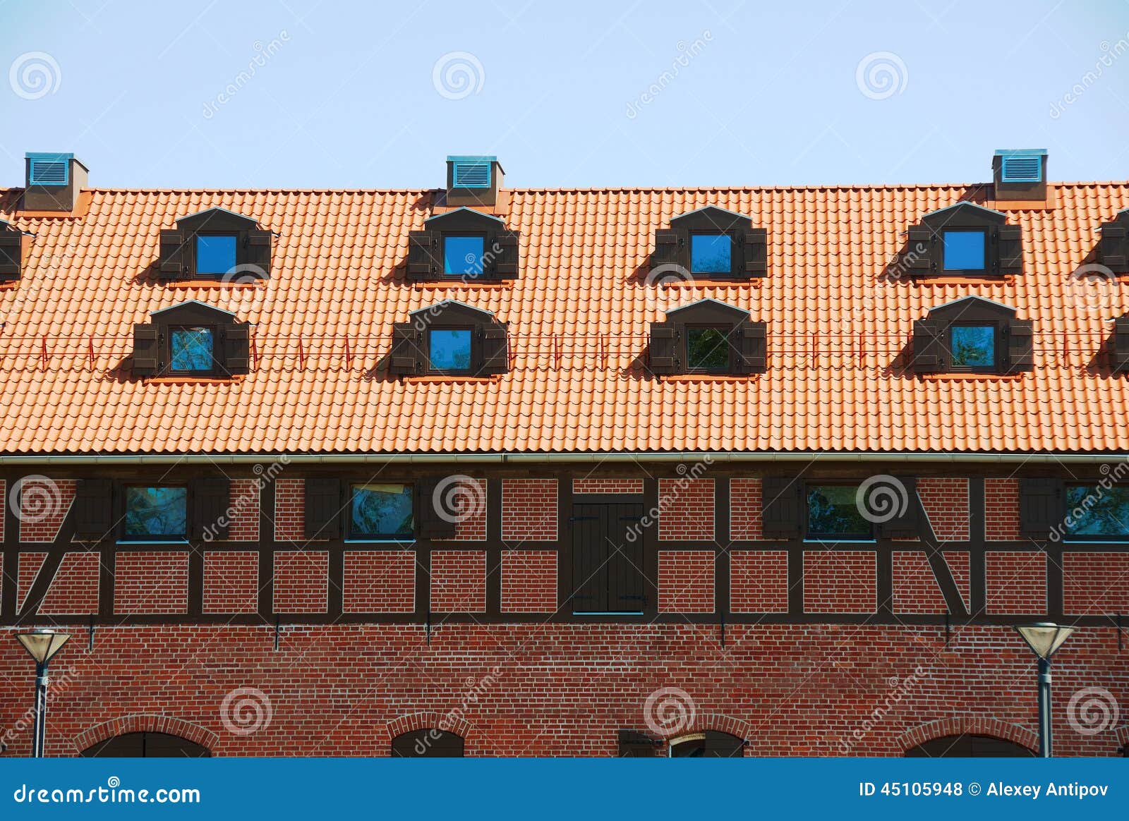 Tile Roof with Windows of an Old Brick House Stock Photo - Image of ...