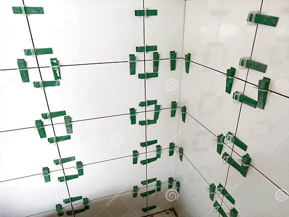 Tile in a Small Space Measuring and Marking a Tile. Stock Photo - Image ...