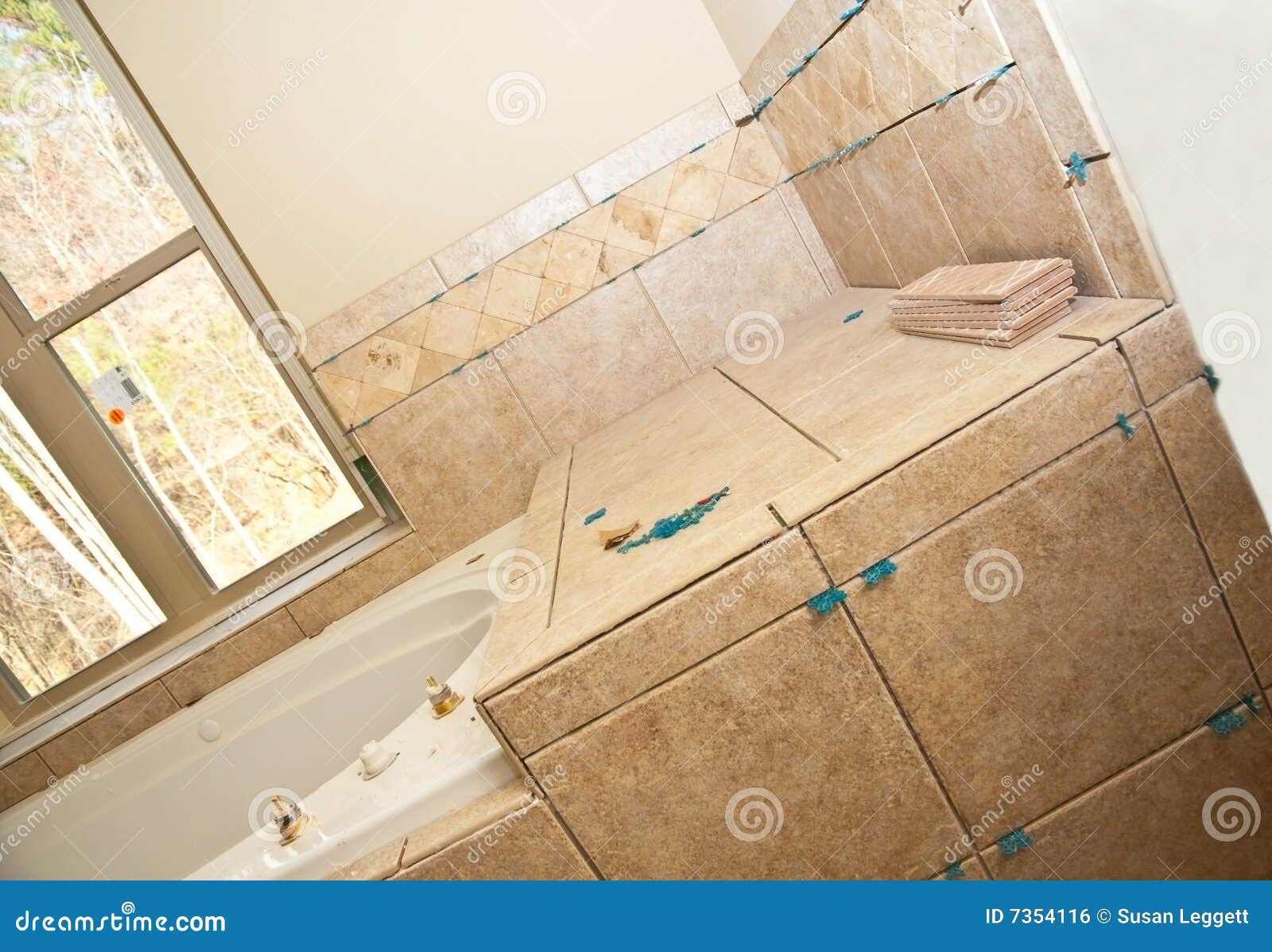 Tile Work in New Bath stock photo. Image of laborer, beige - 7354116