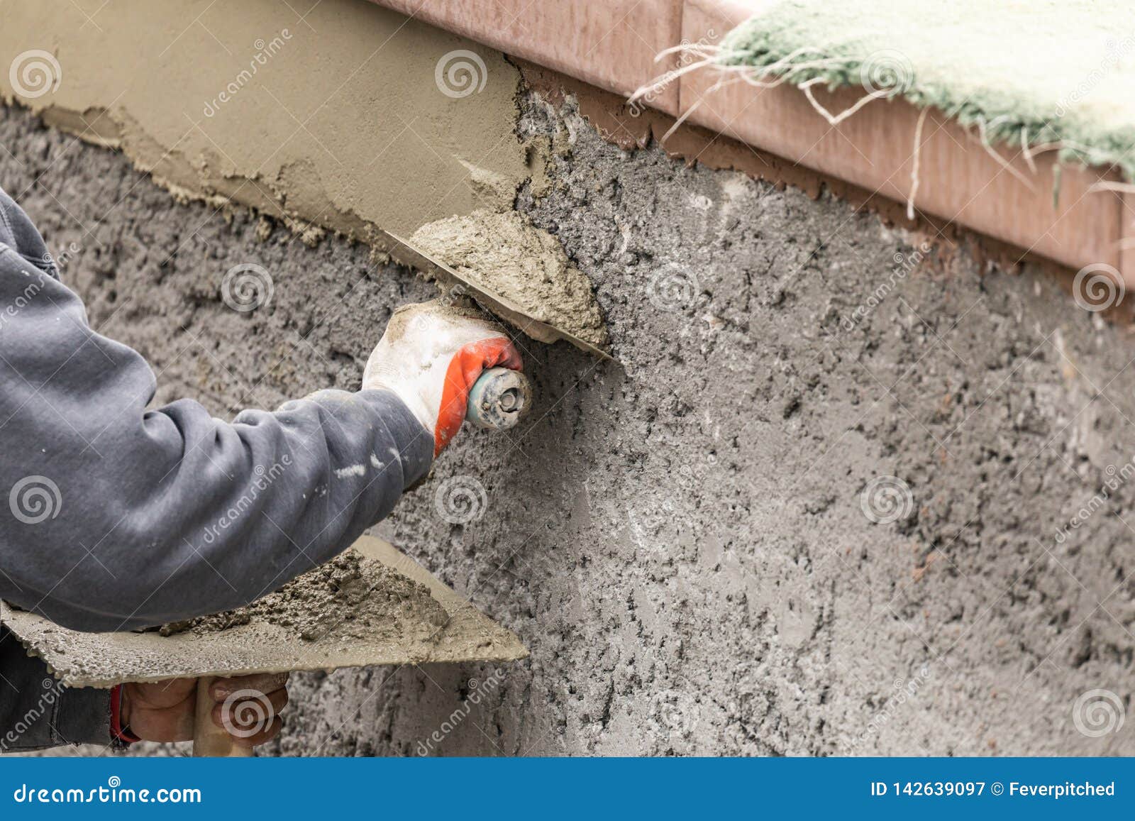 Tile Worker Applying Cement with Trowel at Pool Construction Site Stock ...