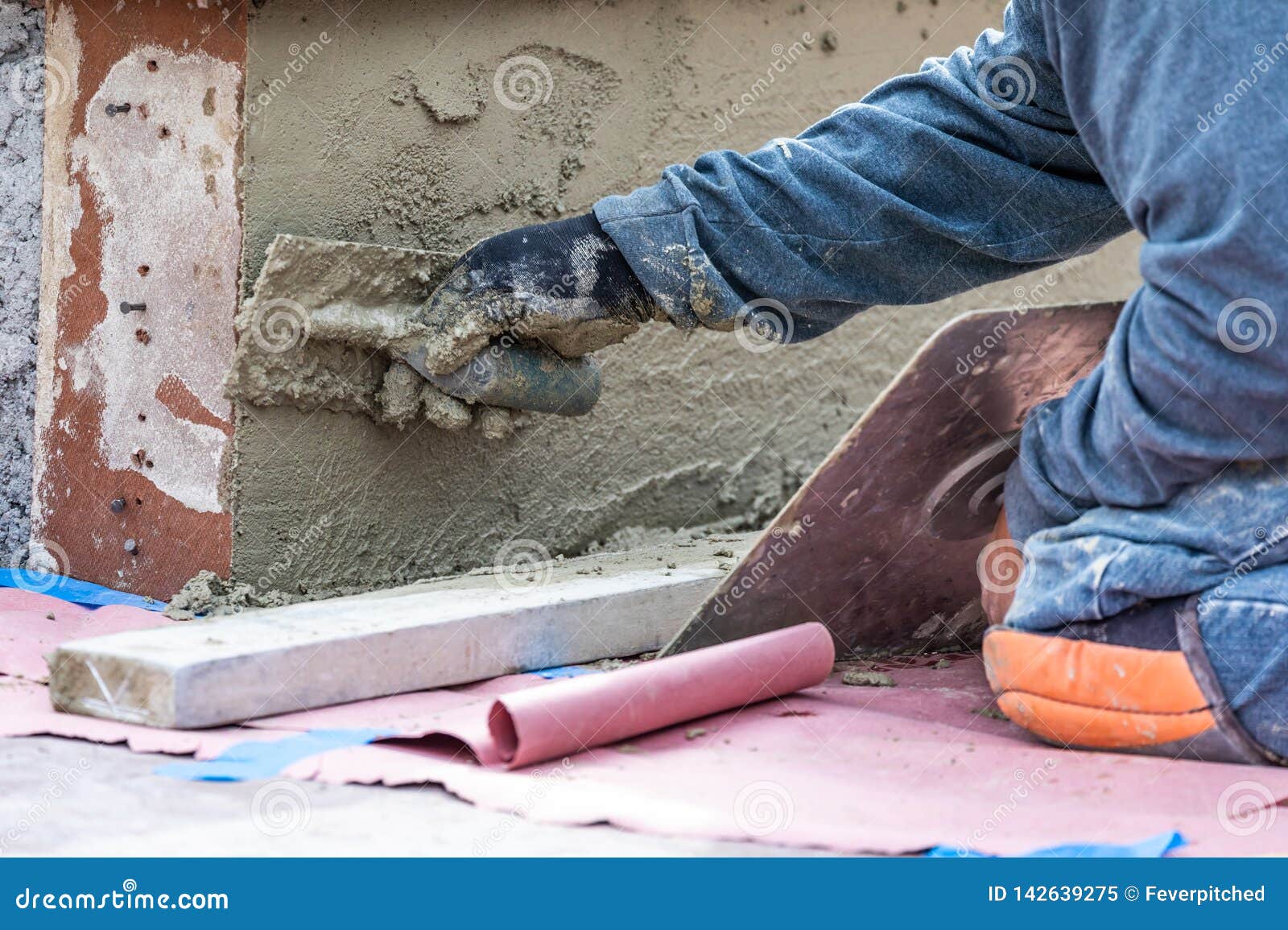 Tile Worker Applying Cement with Trowel at Pool Construction Site Stock ...