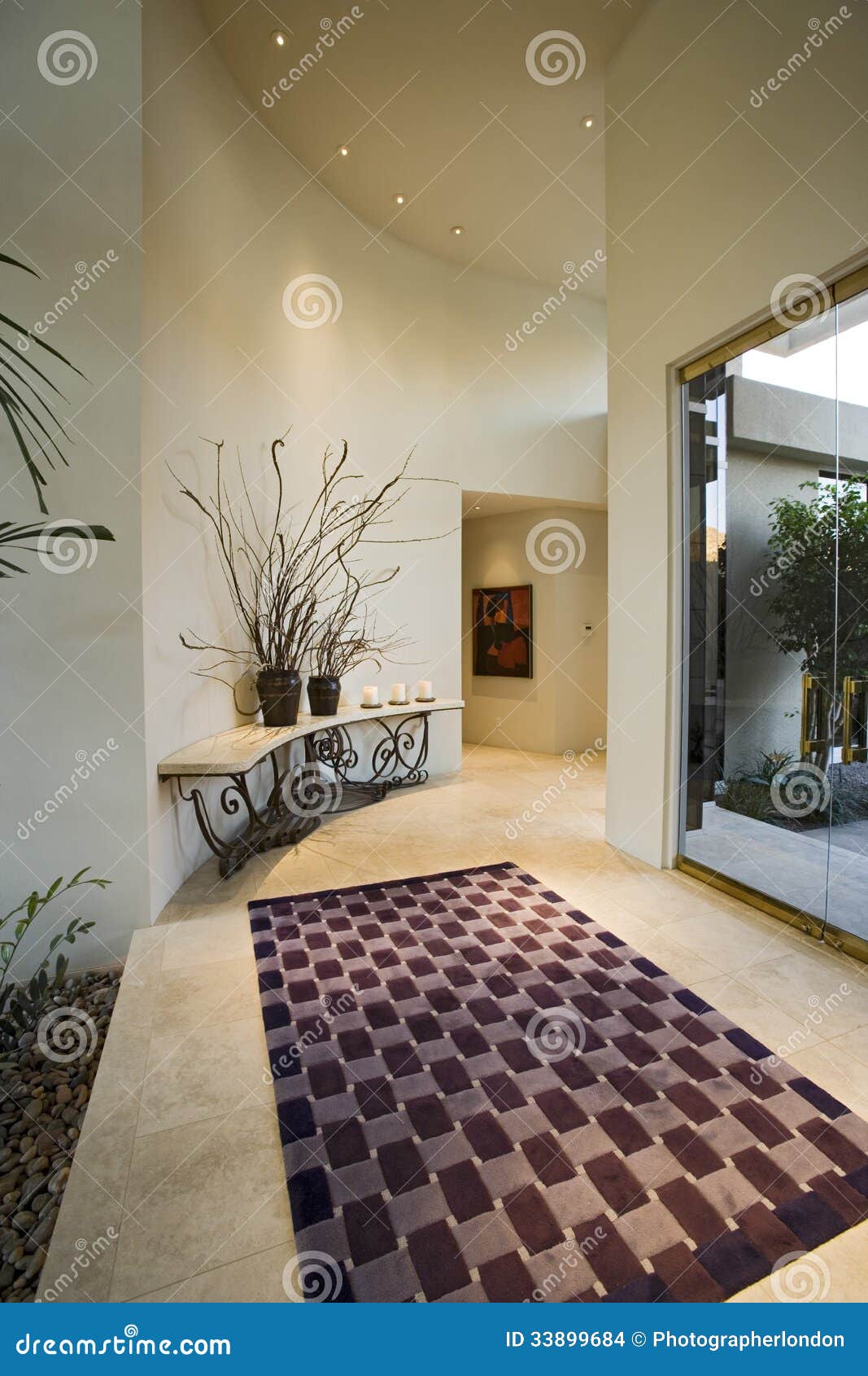 Tiled Hallway in Modern House Stock Photo - Image of table, houseplant ...