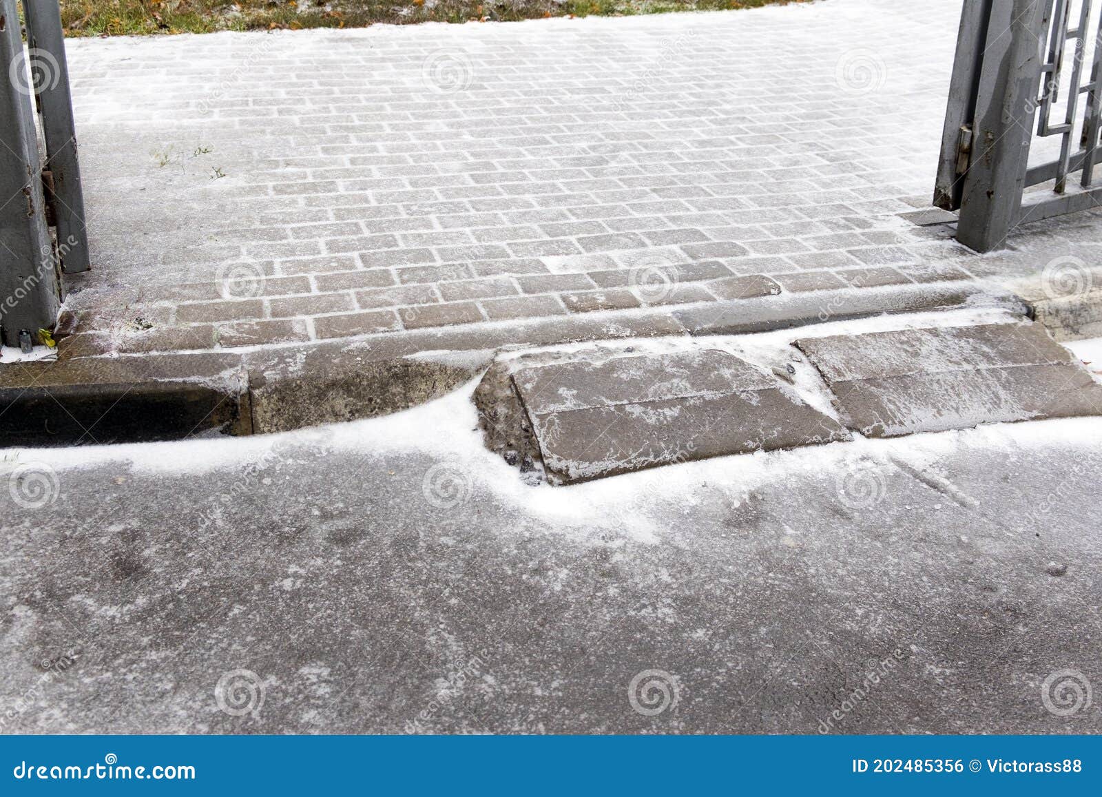 Pavement covered with ice stock photo. Image of outside - 202485356