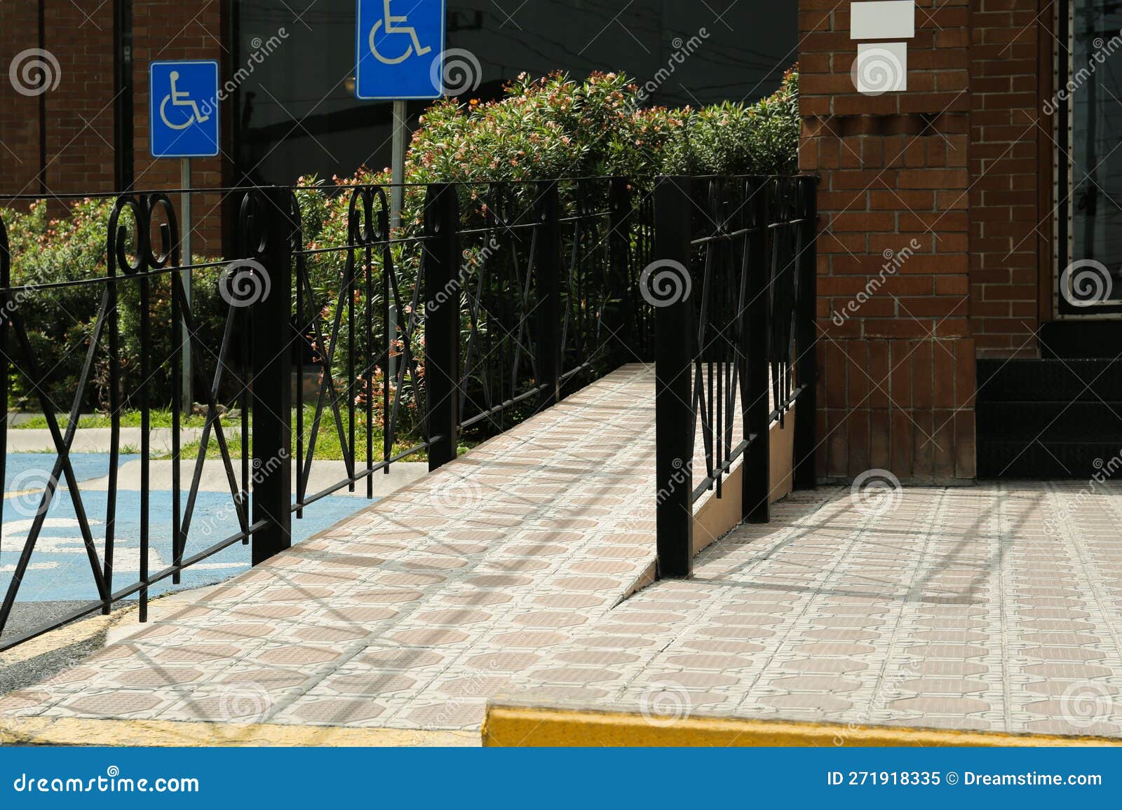 Tiled Ramp with Black Metal Railings Outdoors Stock Image - Image of ...