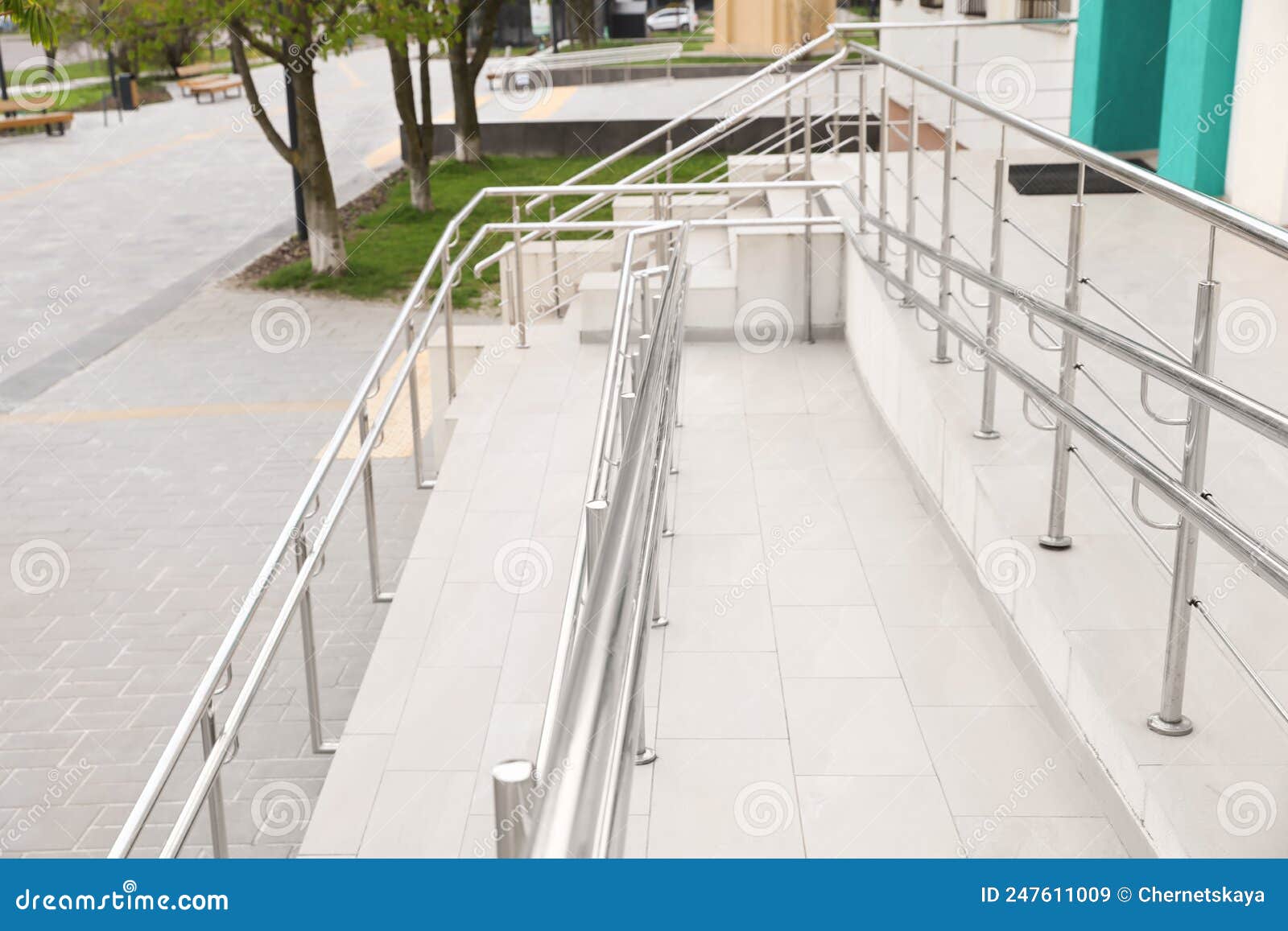 Tiled Ramp with Shiny Metal Railings Outdoors Stock Image - Image of ...