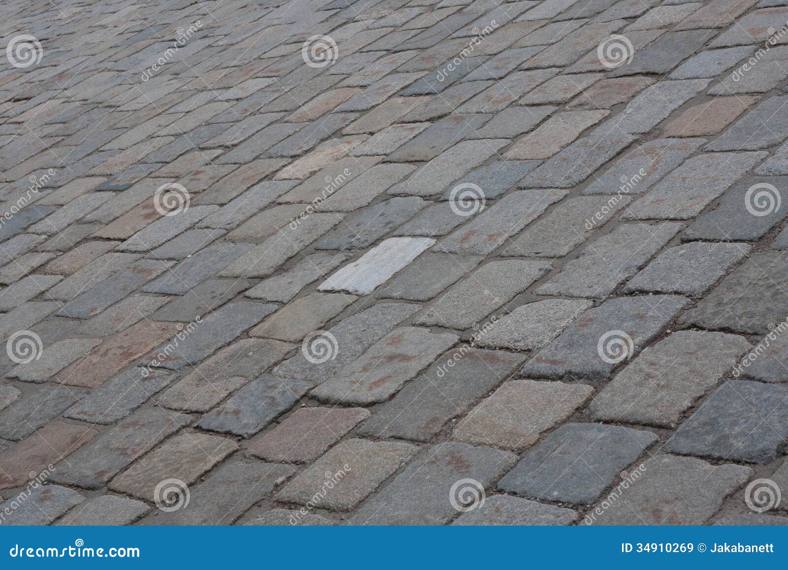 Tiled Street with One Odd Tile Stock Image - Image of gray, blue: 34910269