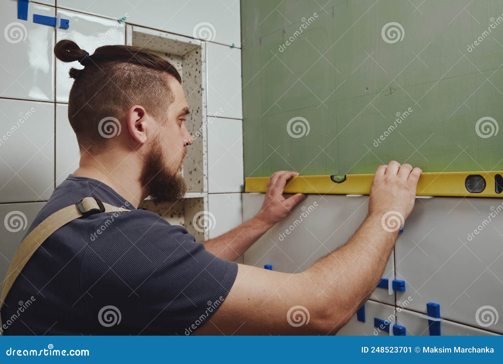 Tiler Checks Tile Laying with Building Measuring Level Stock Image ...