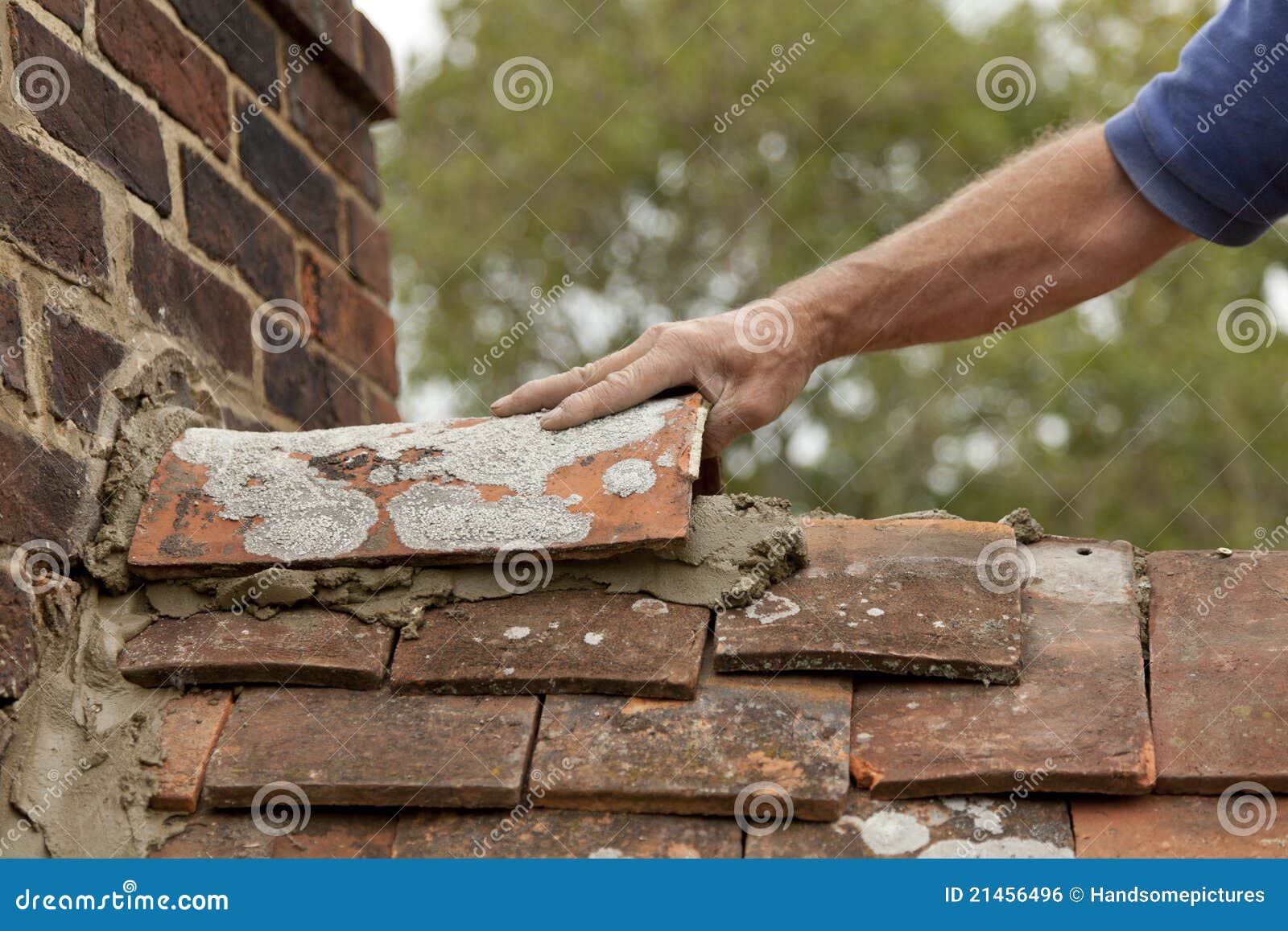 Tiler Fits Ridge Tile on Roof Stock Photo - Image of tiling ...