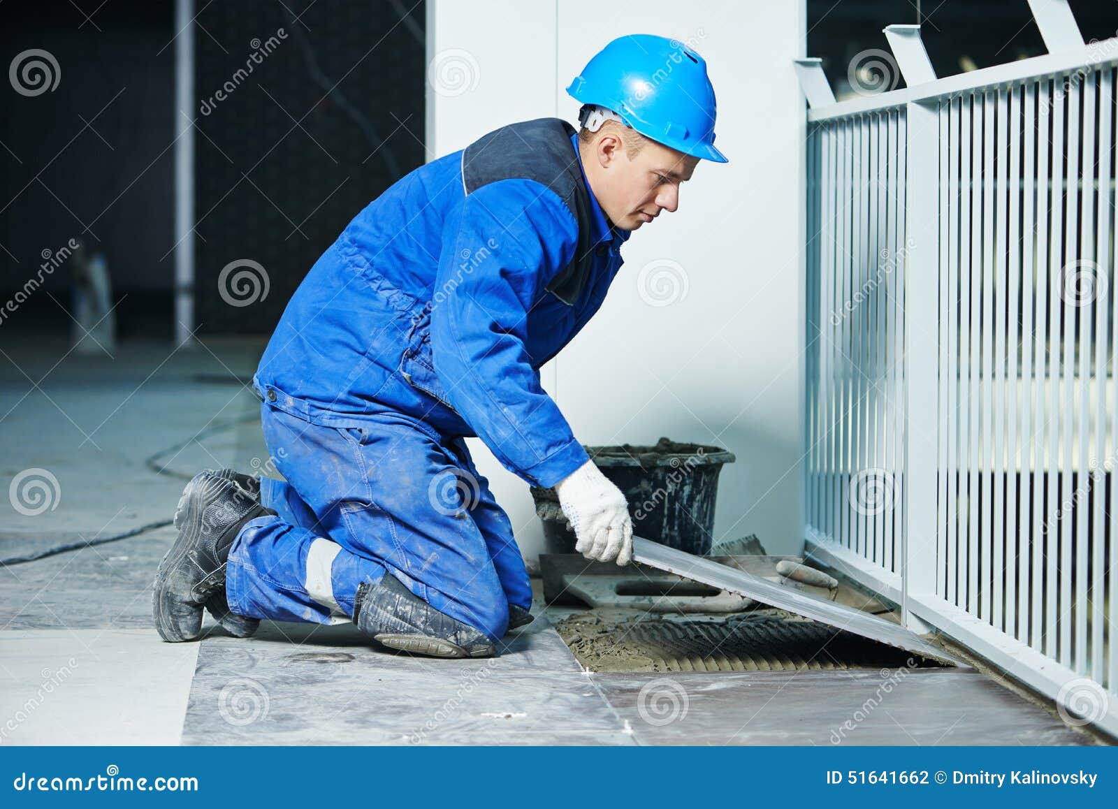 Tiler at Industrial Floor Tiling Renovation Stock Photo - Image of ...
