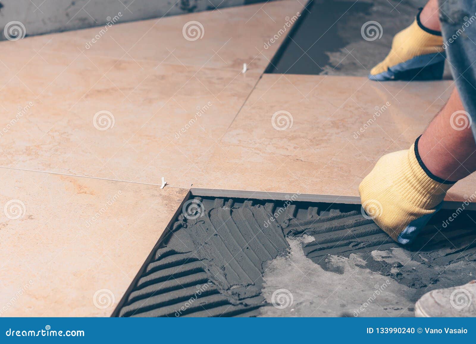 The Tiler Puts the Tile on the Floor Stock Photo - Image of classical ...
