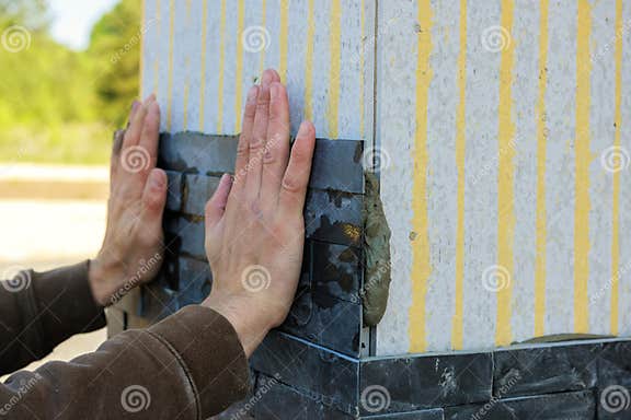 Tiler Responsible for Installing Facing Tiles on Building a Columns ... Tiler Responsible for Installing Facing Tiles on Building a Columns ...