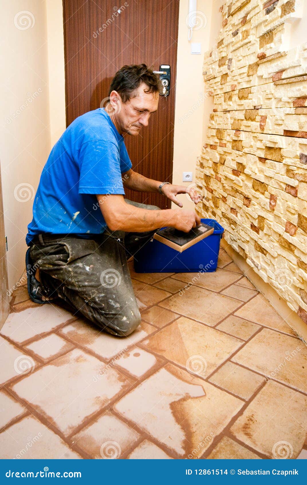 Tiler at work stock photo. Image of lifestyles, kneel - 12861514