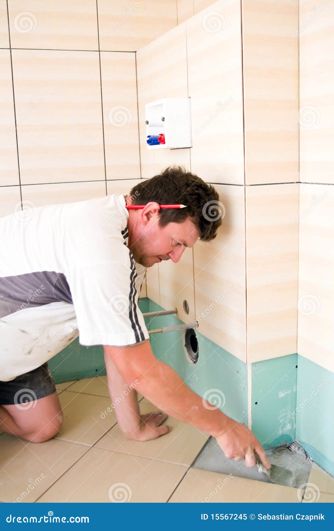 Tiler at work stock image. Image of tiler, work, male - 15567245