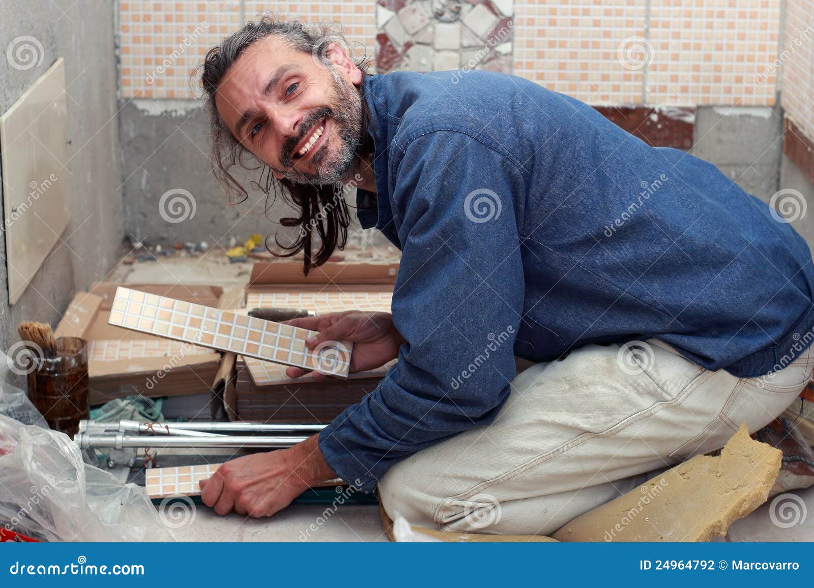 Tiler at work stock photo. Image of construction, tiles - 24964792