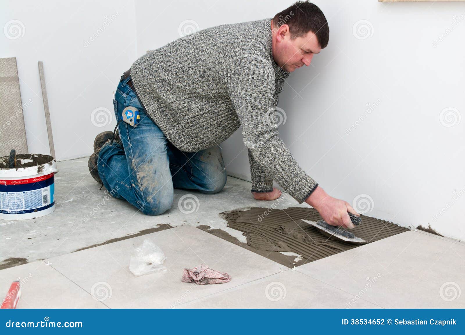 Tiler at work stock photo. Image of forties, improvement - 38534652