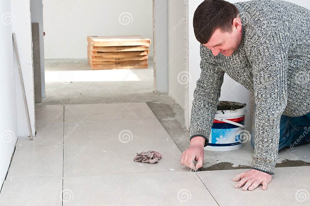 Tiler at work stock image. Image of tile, home, sparse - 38534873