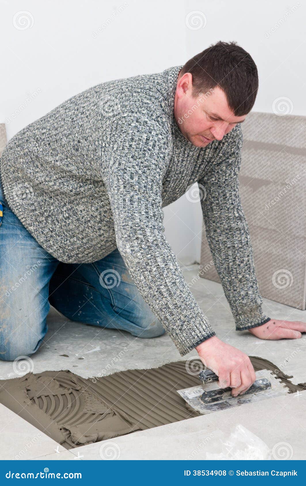 Tiler at work stock photo. Image of laborer, modern, busy - 38534908