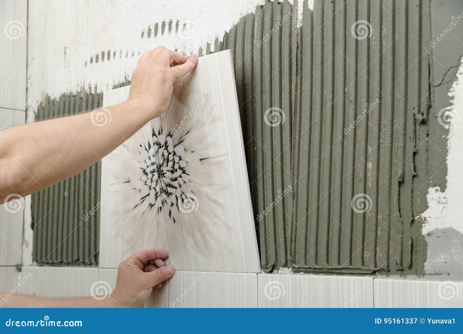 Tilers Hands are Installing a Ceramic Tile. Stock Image - Image of ...