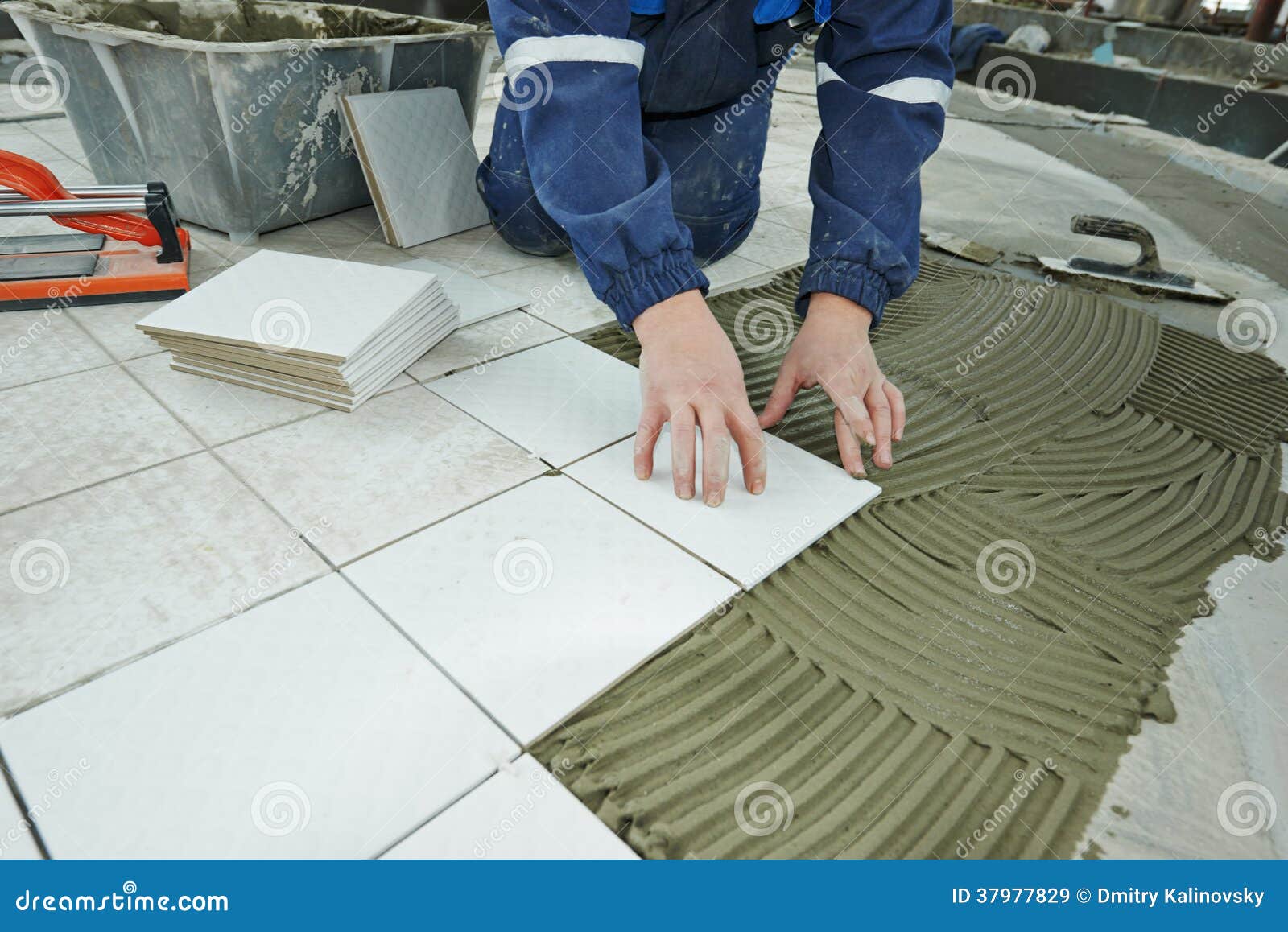 Tilers at Industrial Floor Tiling Renovation Stock Image - Image of ...