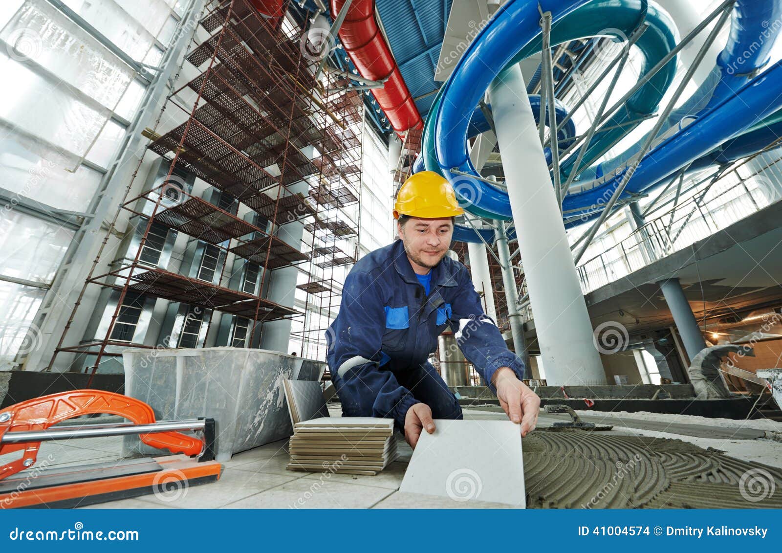 Tilers at Industrial Floor Tiling Renovation Stock Photo - Image of ...