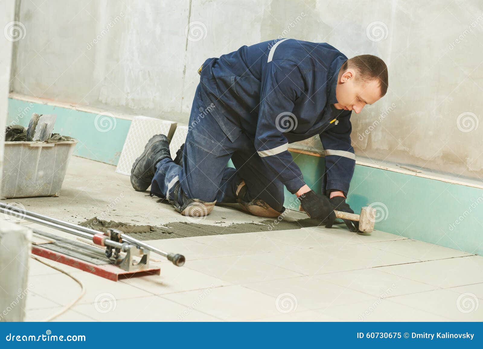 Tilers at Industrial Floor Tiling Renovation Stock Image - Image of ...