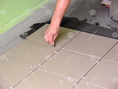 Tiles installation stock photo. Image of arrange, close - 12085744