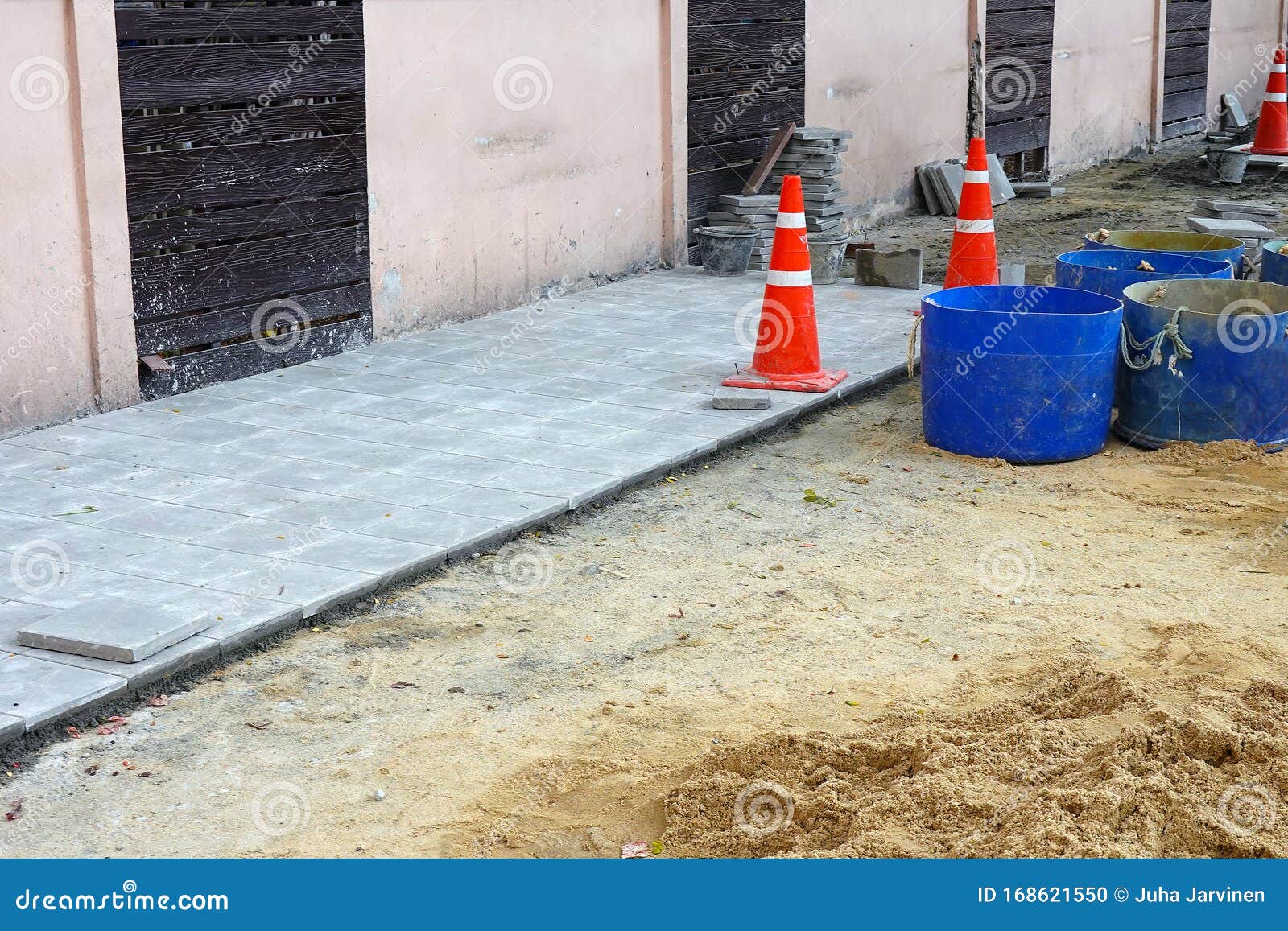 Tiling pavement stock photo. Image of bucket, sand, brick - 168621550