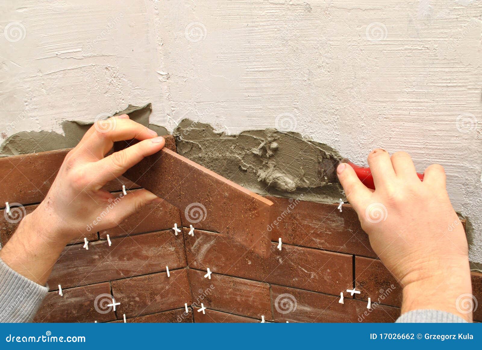 Tiling a Wall stock photo. Image of decorating, apartment - 17026662