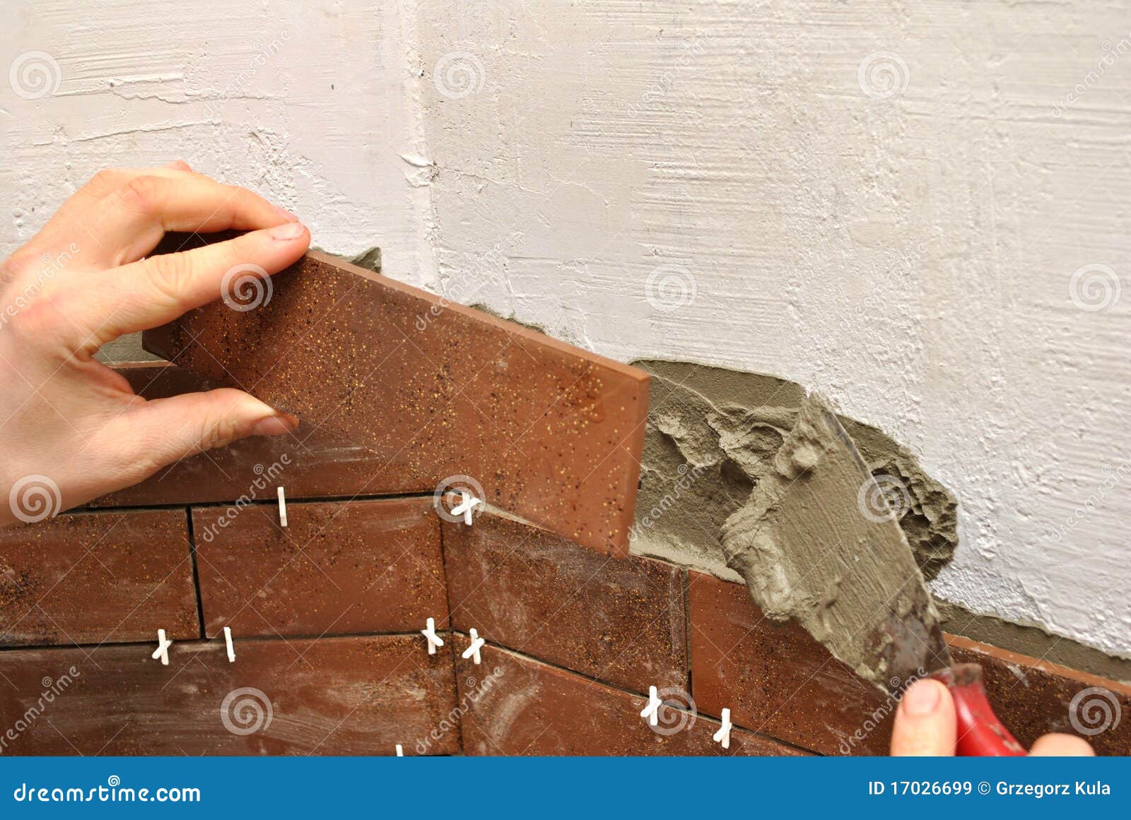 Tiling a Wall stock image. Image of cement, putting, estate - 17026699