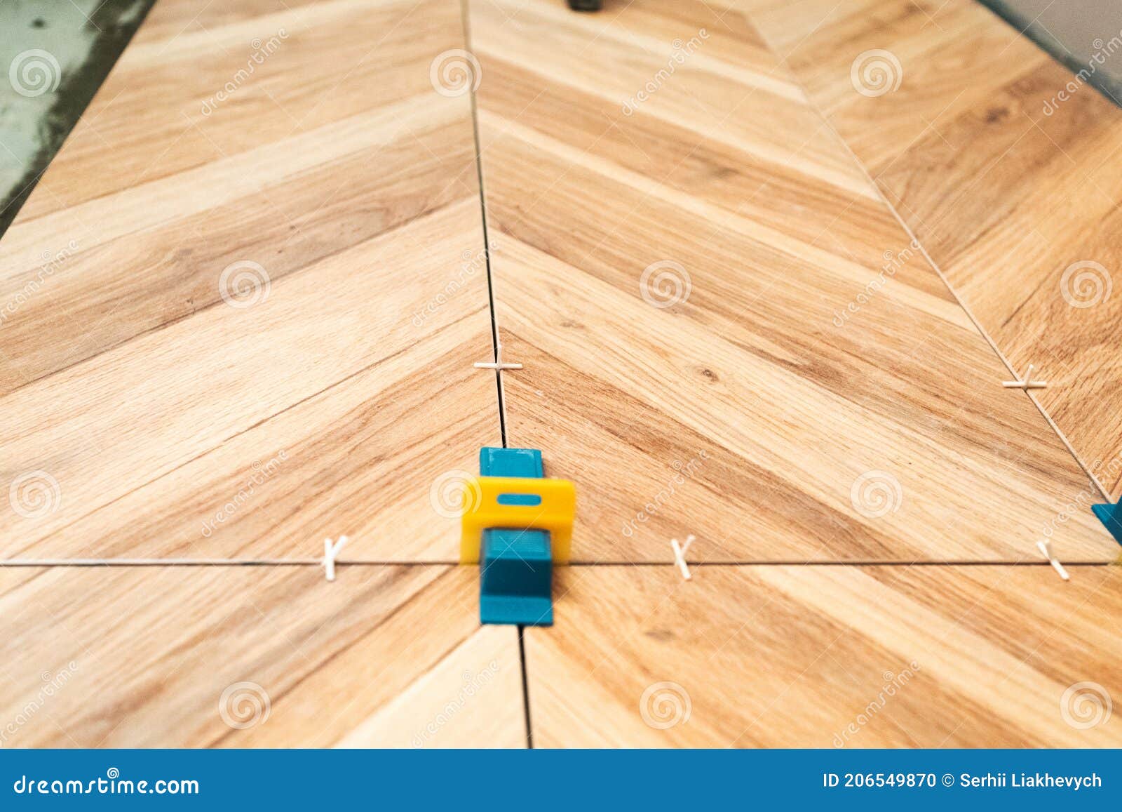 Tiling Work. Layed Tiles with Crosses for Tiles and 3d Crosses Stock ...