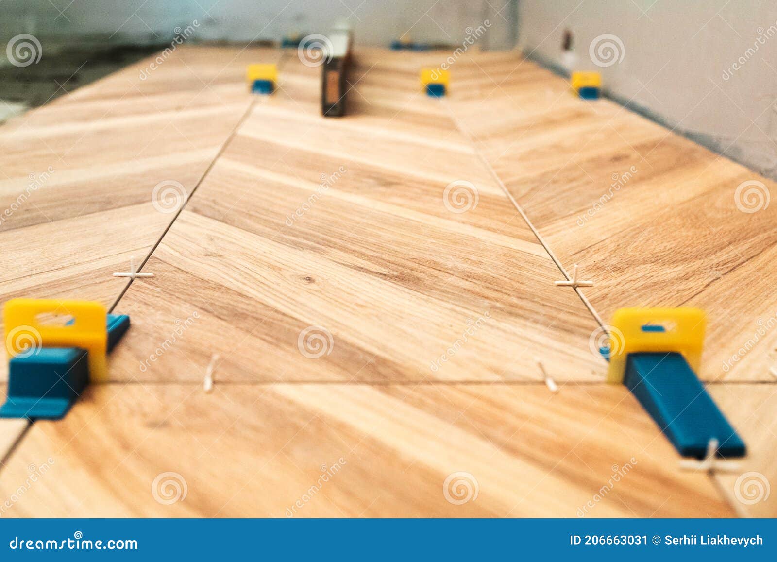 Tiling Work. Layed Tiles with Crosses for Tiles and 3d Crosses Stock ...