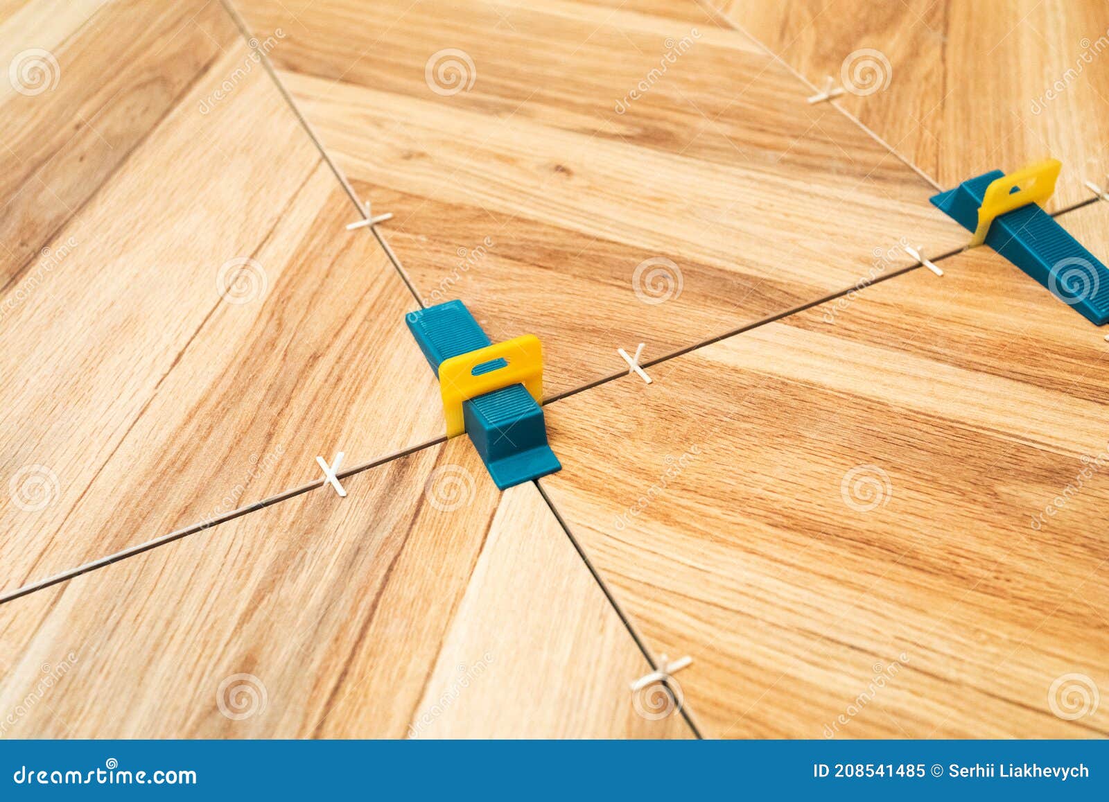 Tiling Work. Layed Tiles with Crosses for Tiles and 3d Crosses Stock ...