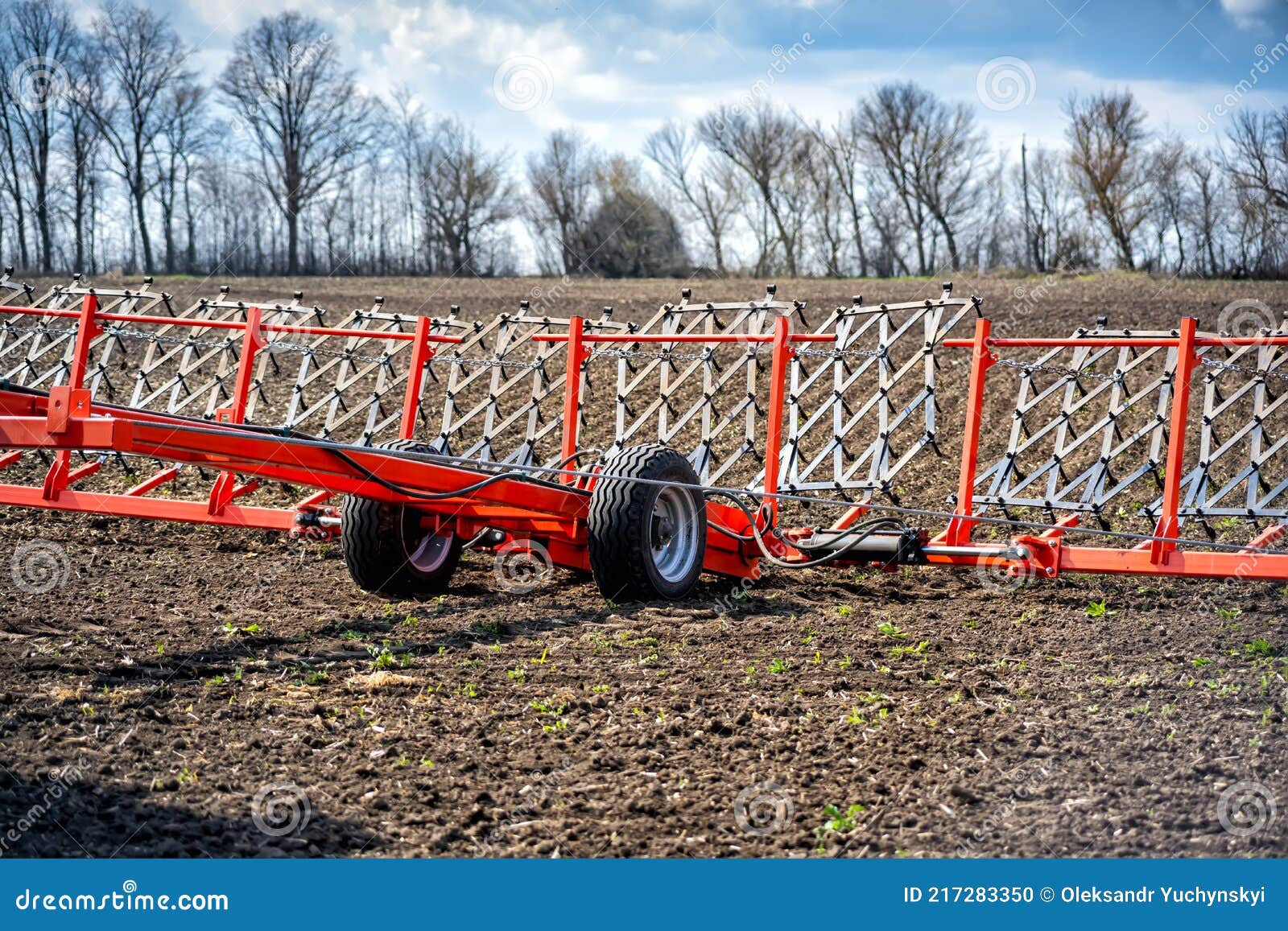 Tillage in the Field with a Tractor with a Trailed Machine Stock Photo ...