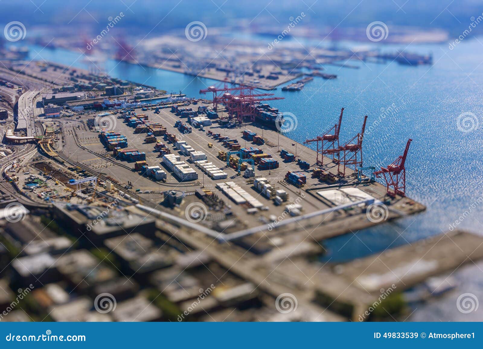 Tilt Shift of Shipping Port with Containers and Loading Transport Ship ...