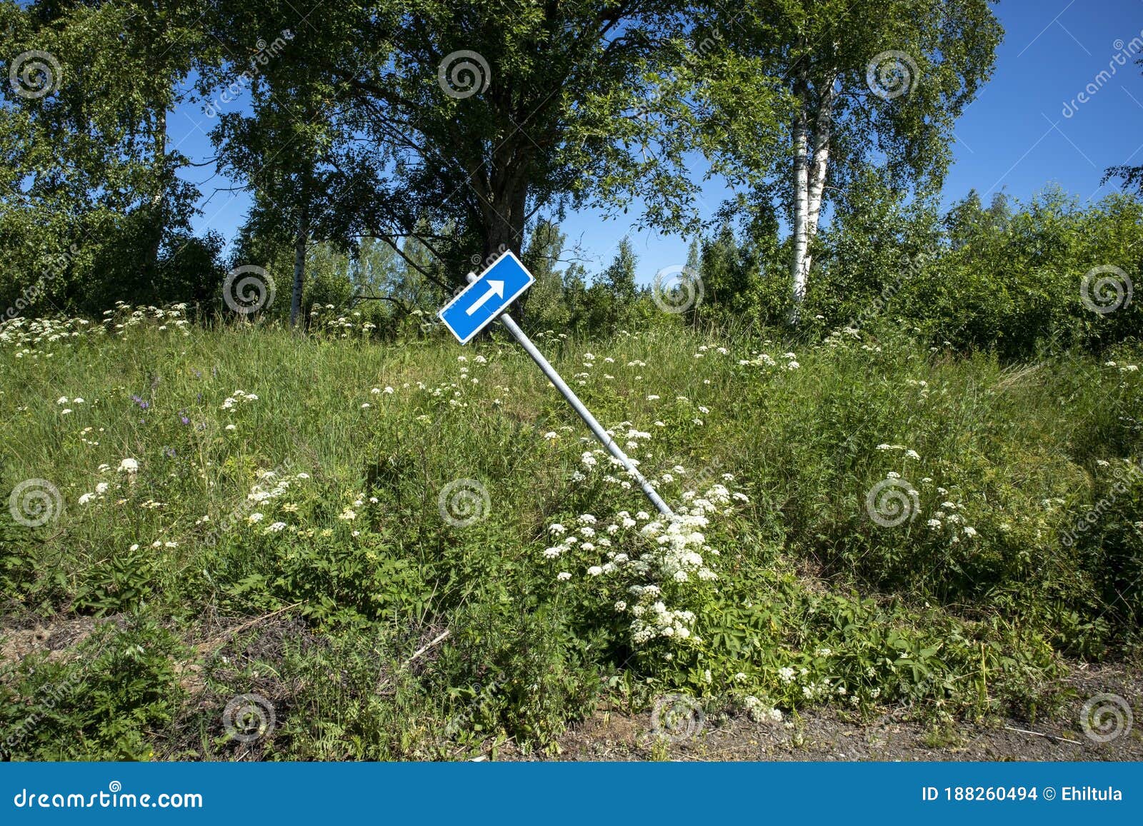 Tilted Traffic Signpost with Arrow Pointing Upper Right Stock Photo ...