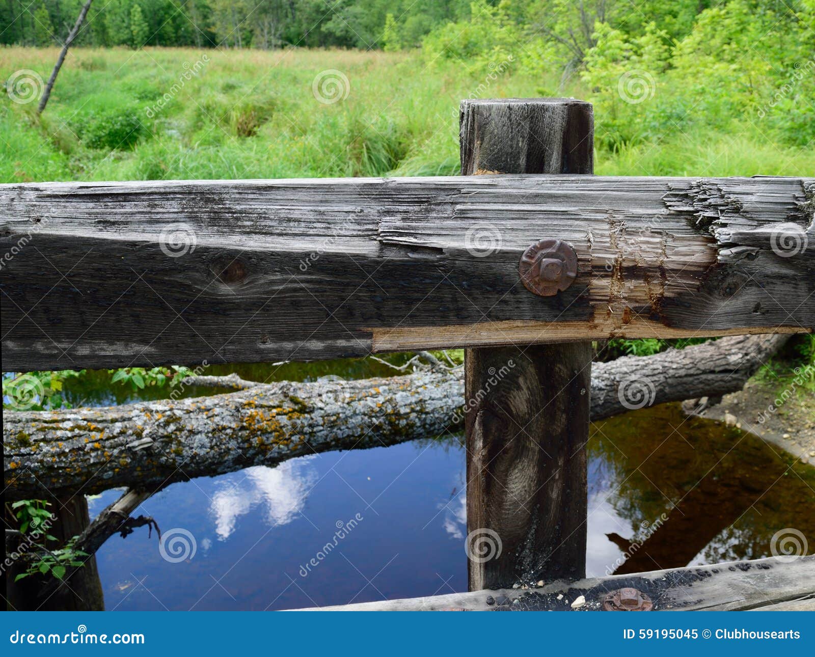 Timber Bridge Guardrail with Stream in Background Stock Image - Image ...