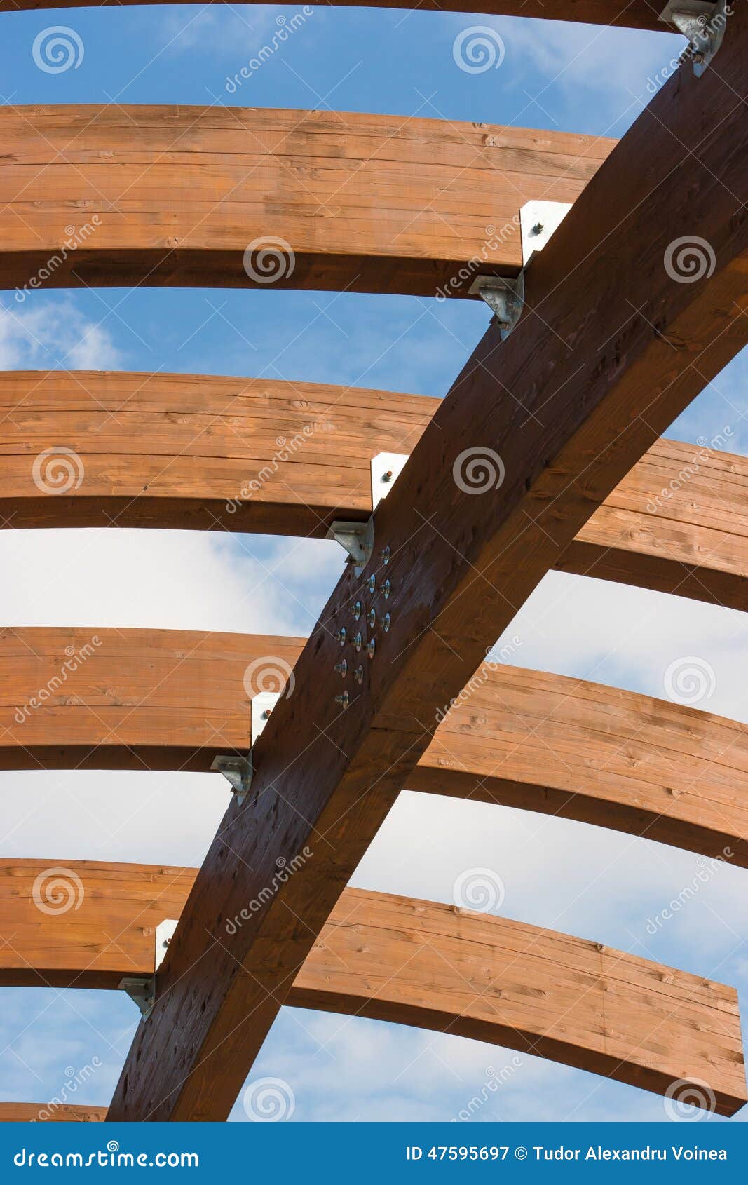 Timber Frame Arch Against Blue Sky Midday Underneath View. Stock Image ...