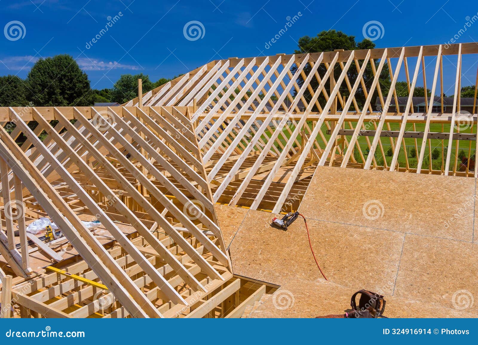 Timber Roofing Truss Frame Installation during Construction of a Home ...