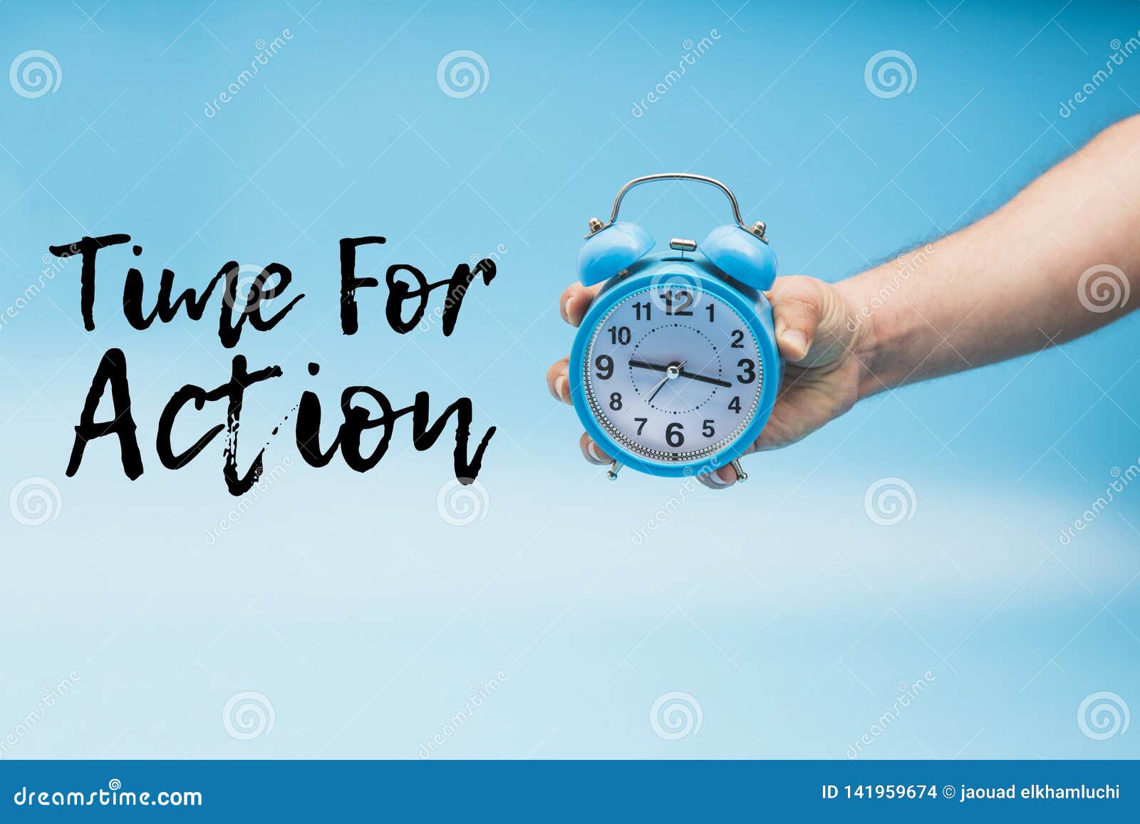 Time for Action and a Hand Holding a Blue Analog Alarm Clock Stock ...