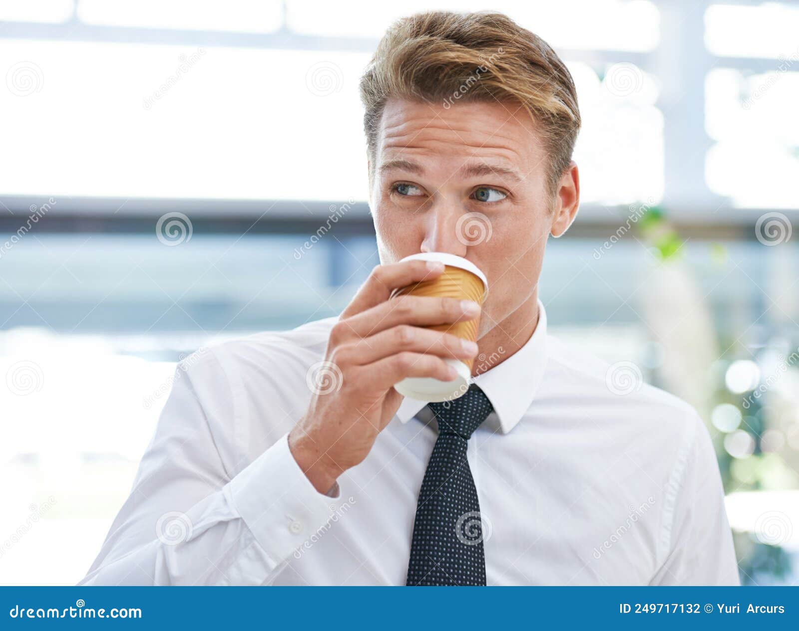 Time for a Coffee Break. a Young Businessman Drinking a Cup of Coffee ...