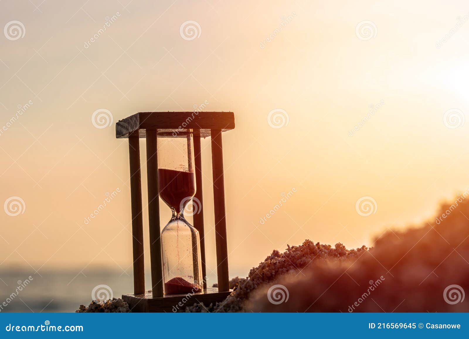Time Concept Hourglass on Sandy Beach in Summer with Sea Background ...