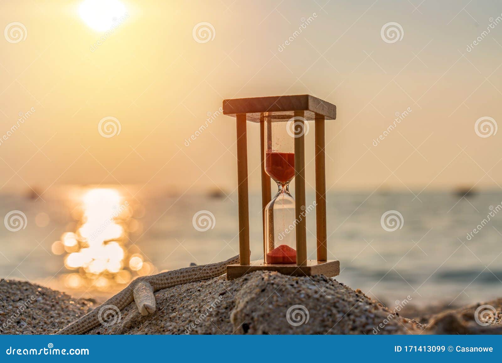 Time Concept Hourglass And Starfish On Sandy Beach In Summer With Sea ...