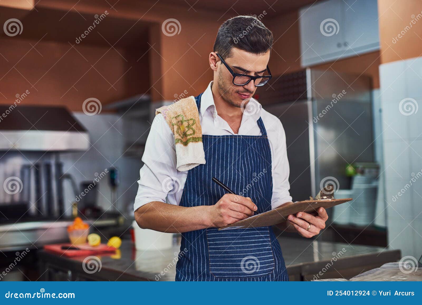 Time for the Inventory Checklist. a Man Working at a Restaurant. Stock ...
