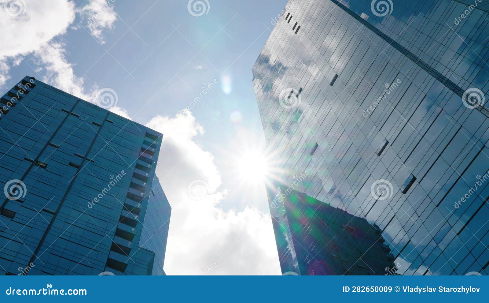 Time Lapse of Clouds Reflecting into the Glass of a Large Office ...