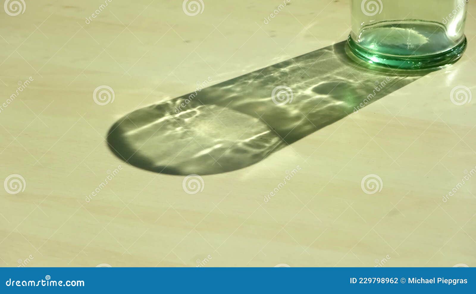 Time Lapse of a Drinking Glass with Moving Shadow and Caustic Light ...