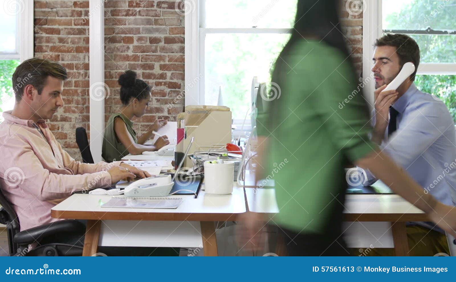 Time Lapse Sequence of Workers at Desks in Design Office Stock Video ...