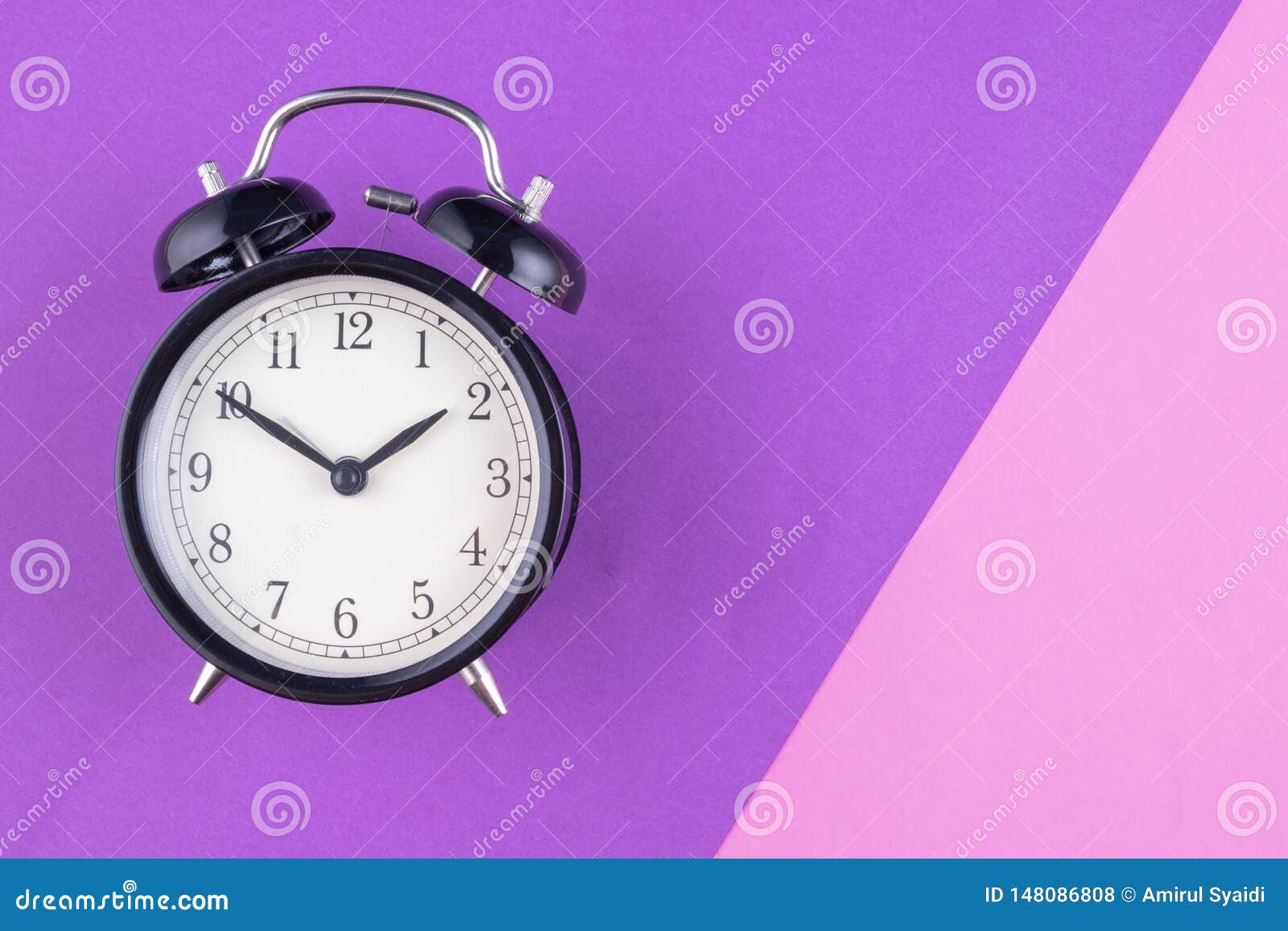 Time Management Concept, Alarm Clock on Purple Background Stock Photo ...
