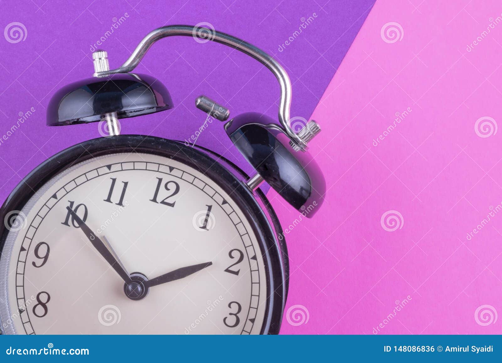 Time Management Concept, Alarm Clock on Purple Background Stock Photo ...